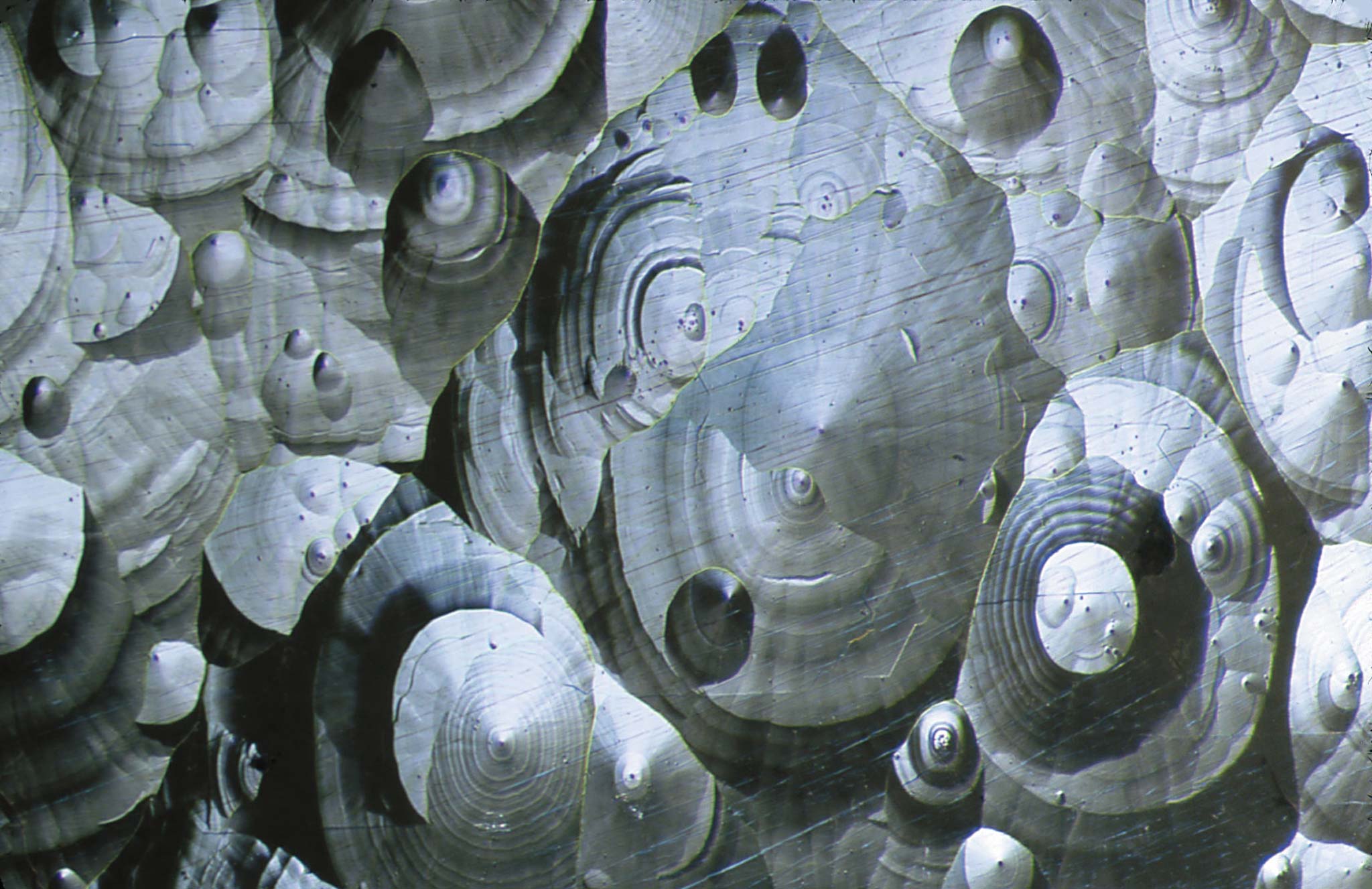 Synthetic topaz crystal surface | Nikon Small World