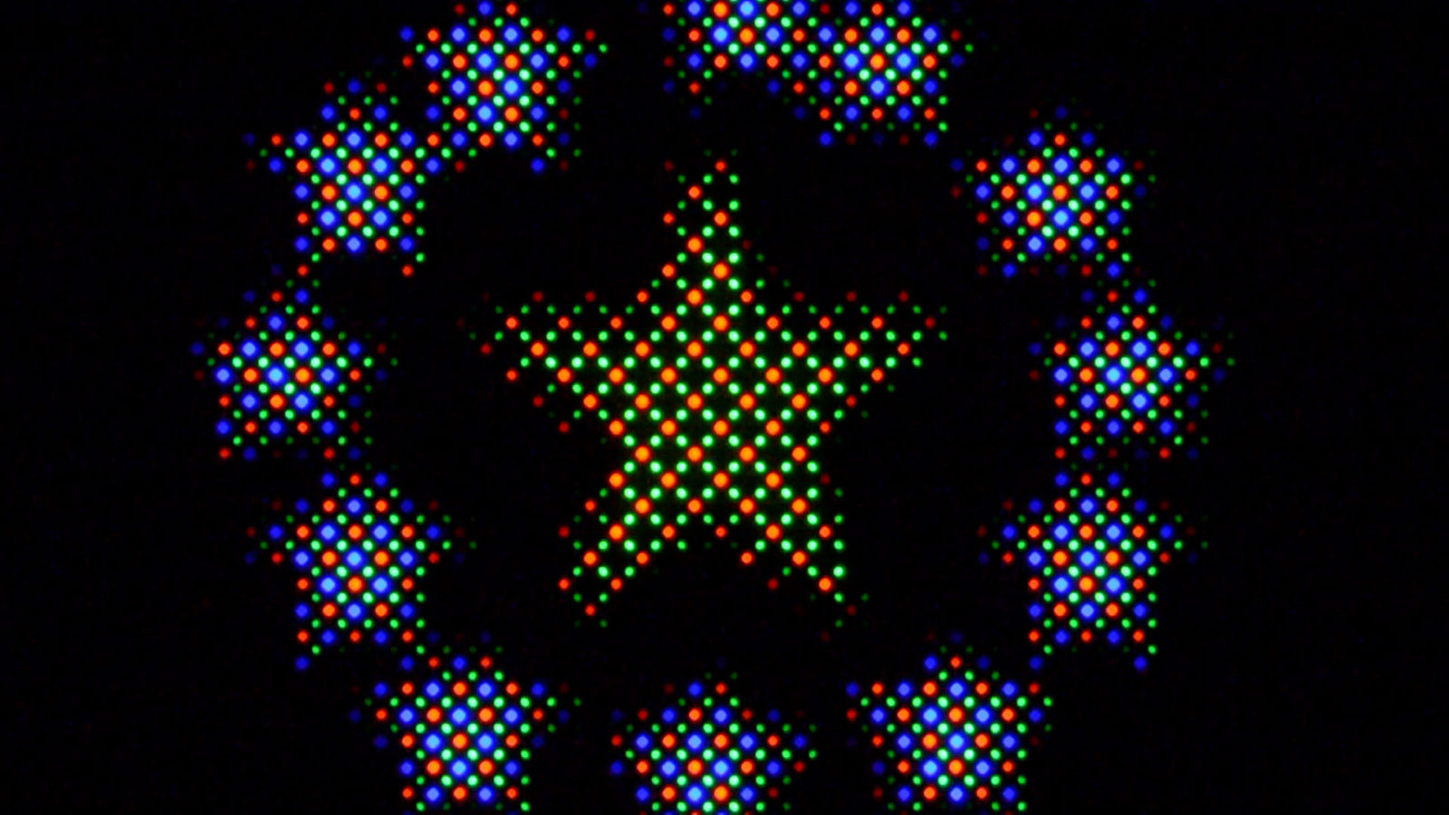 Magnified view of pixels on a smartphone screen displaying animated ...